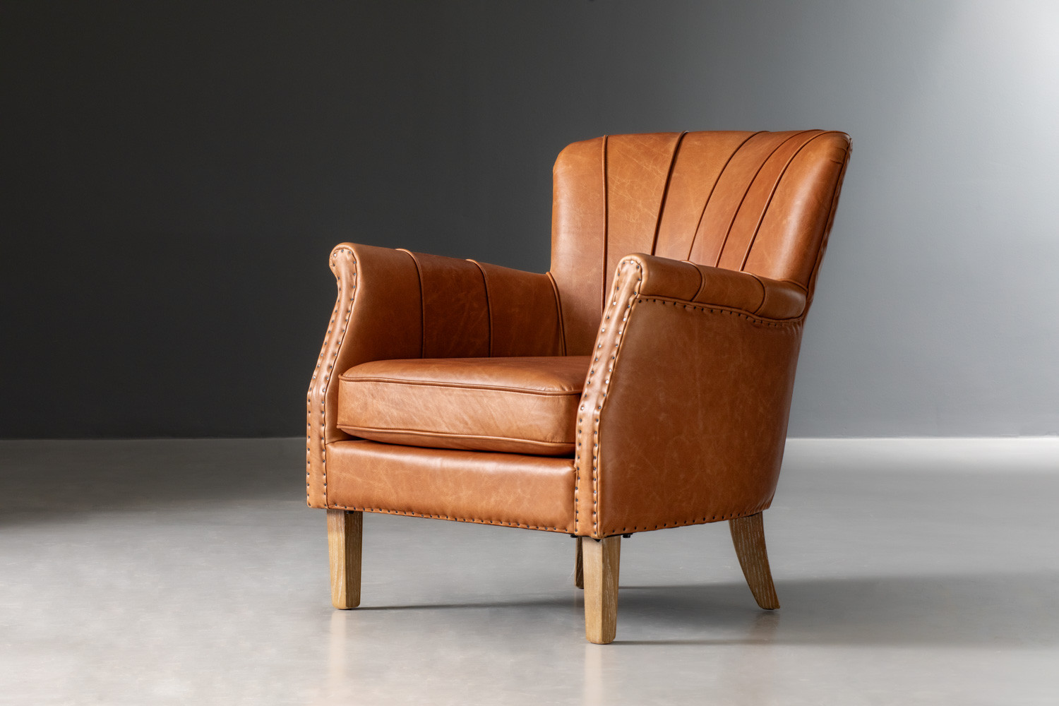 Tan leather armchair store